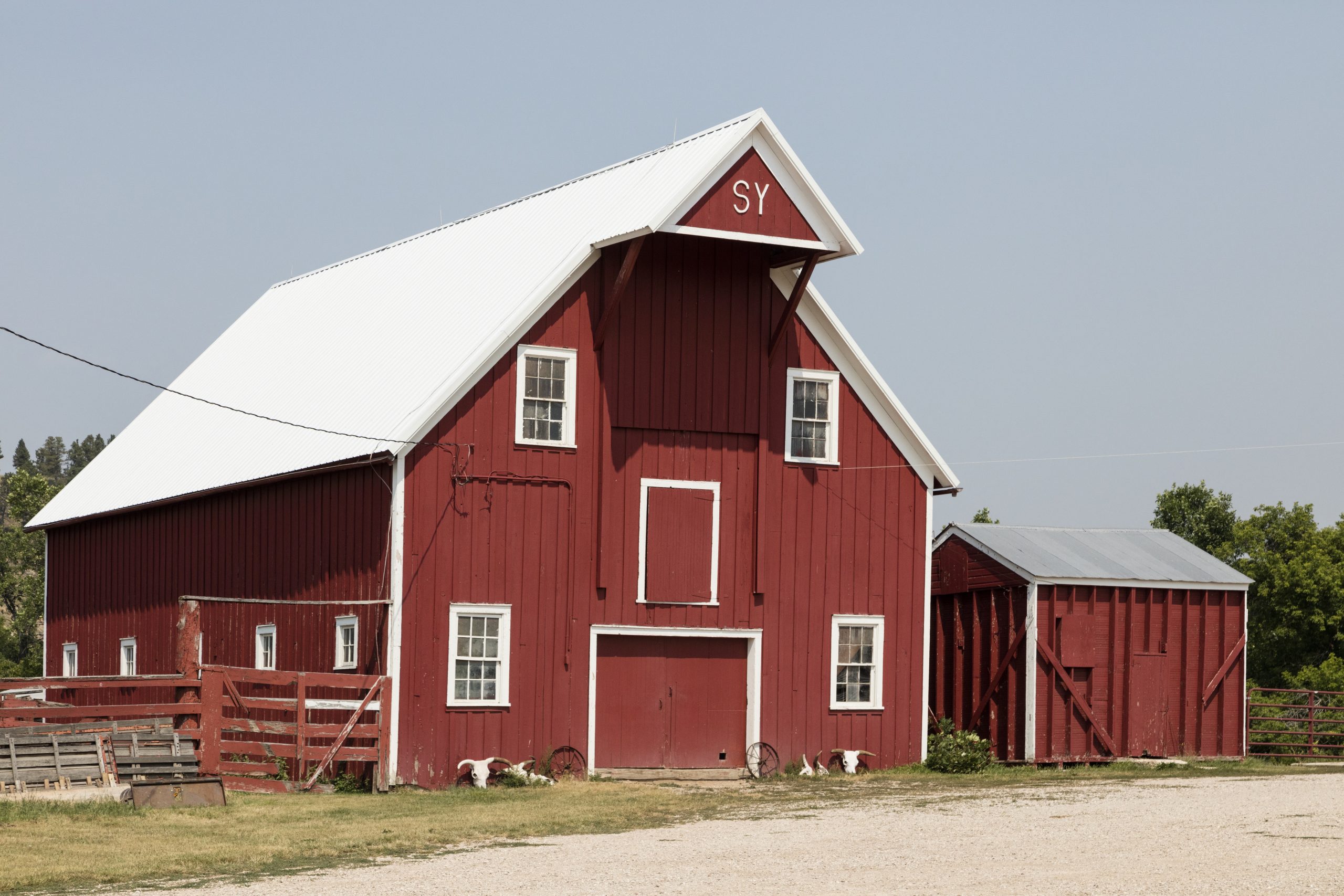 SY Ranch red barn photo with brand - Keyhole Land Company